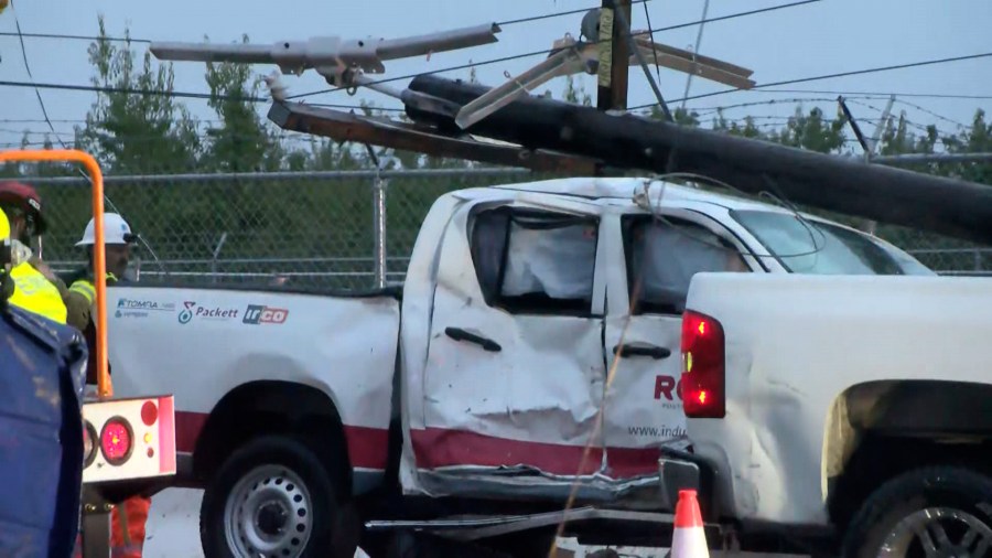 Woman trapped after truck hits power pole in Fresno County