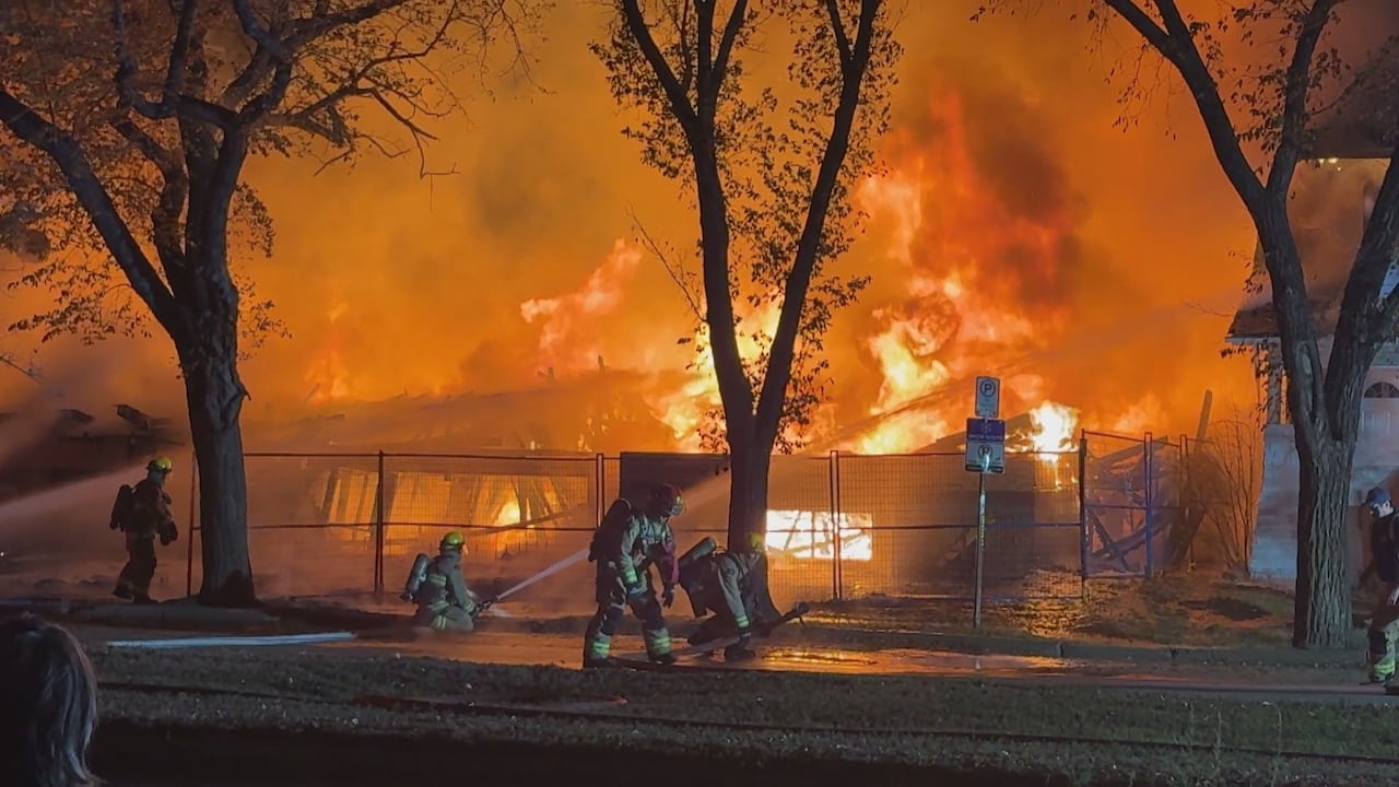 Dozens of firefighters work to put out large fire east of downtown Regina