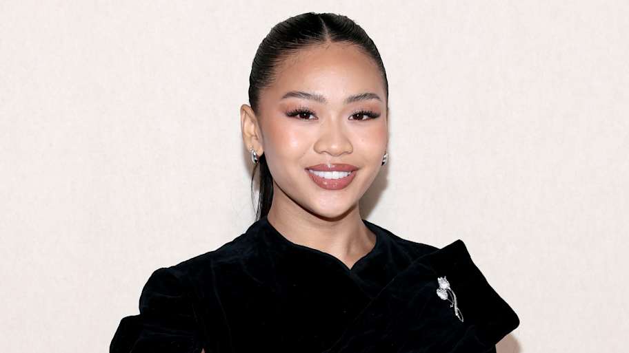 Suni Lee Is Sleek Perfection in Black Tank, Baggy Jeans