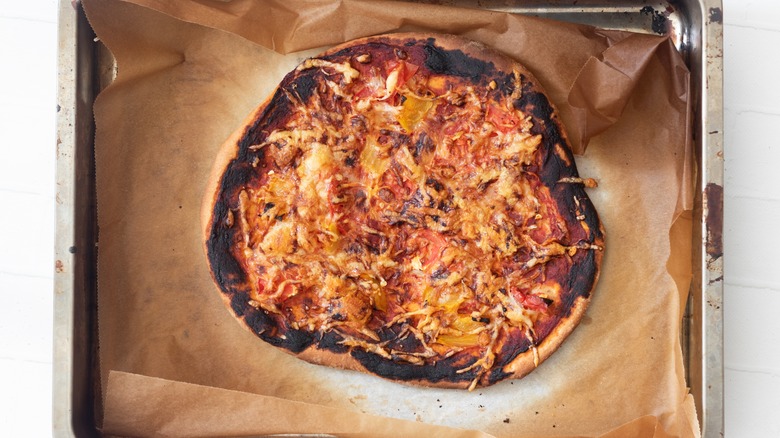 Why You Shouldn't Resist Charred Pizza Crust, According To An Expert
