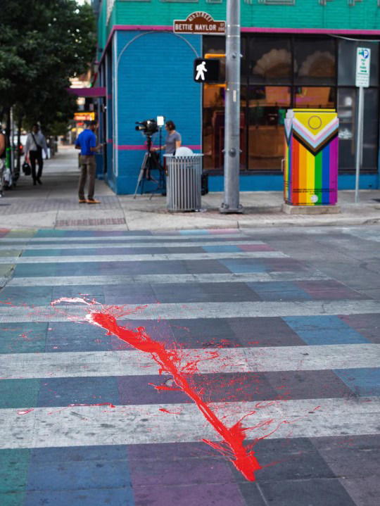 ‘Feel so much community’: AFD removes red paint thrown on rainbow ...