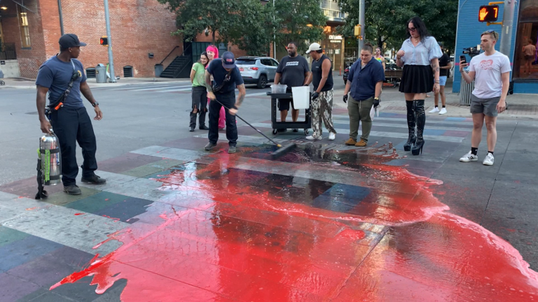 ‘Feel so much community’: AFD removes red paint thrown on rainbow ...