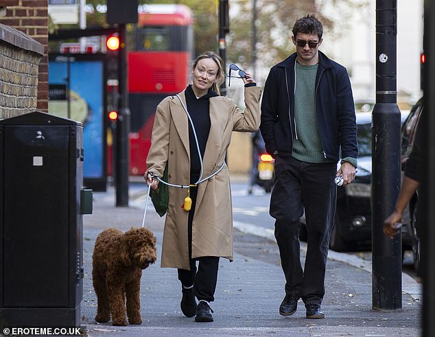 Olivia Wilde enjoys a romantic stroll with boyfriend Caspar Jopling and her new dog in Primrose Hill