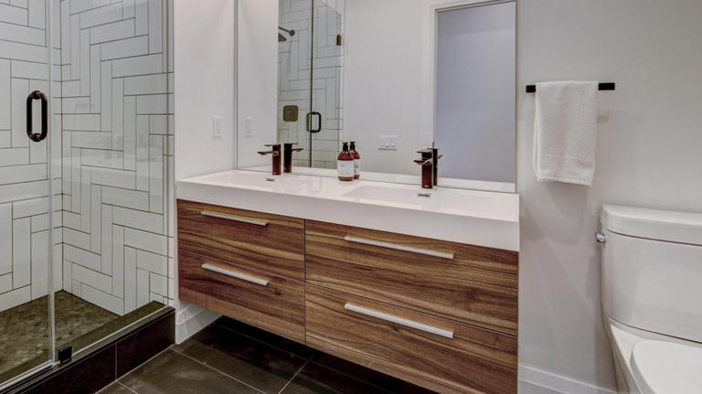 The Towel Storage Mistake That's Making Your Bathroom Feel Cluttered