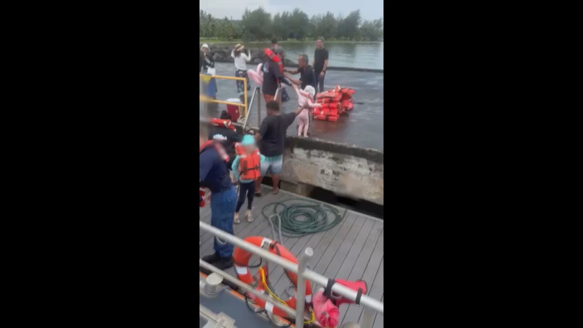 U.S. Coast Guard and Guam firefighters rescue 45 people from disabled boat