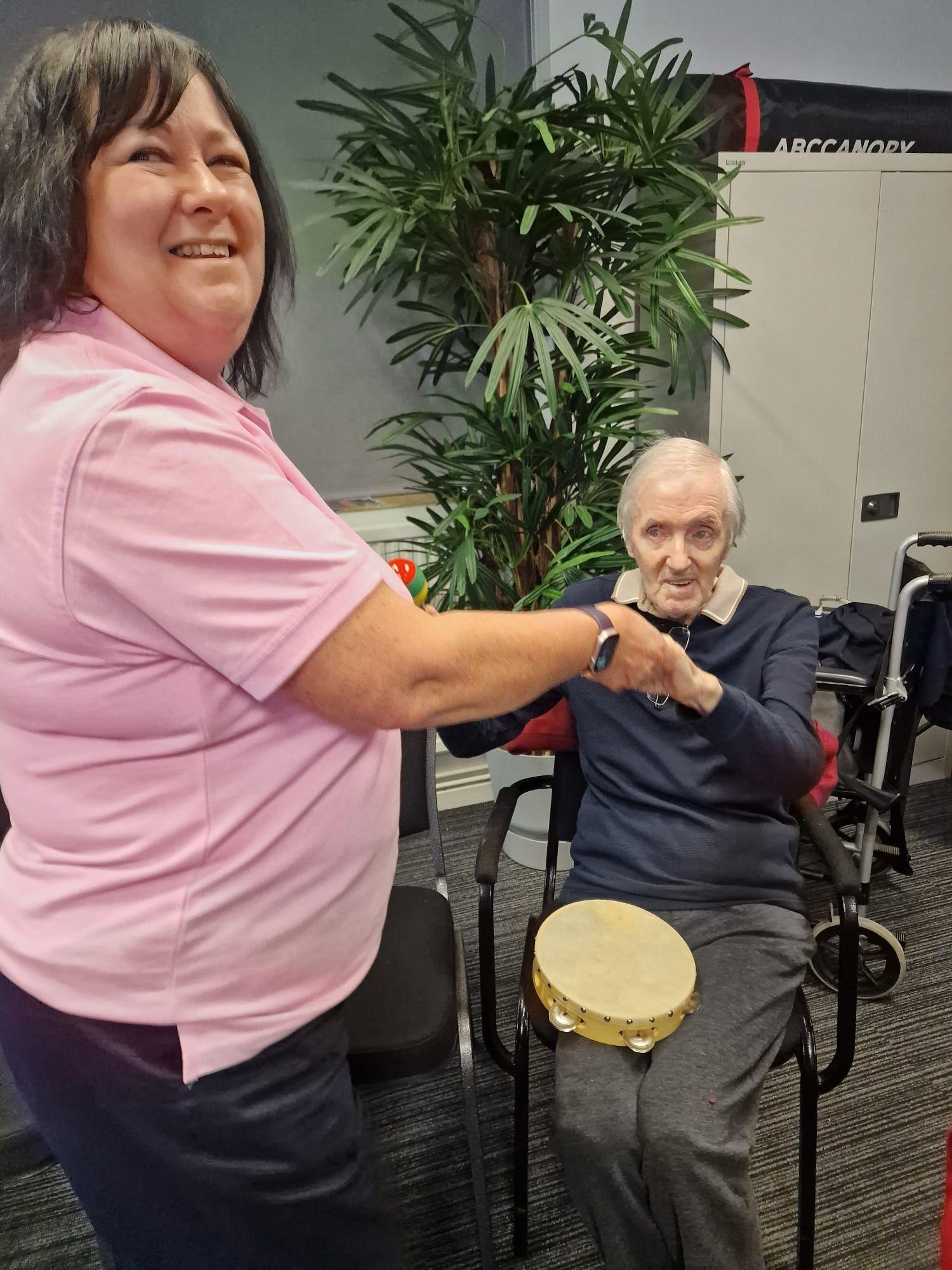 Local care home residents' delightful morning at Dementia Sings Out!