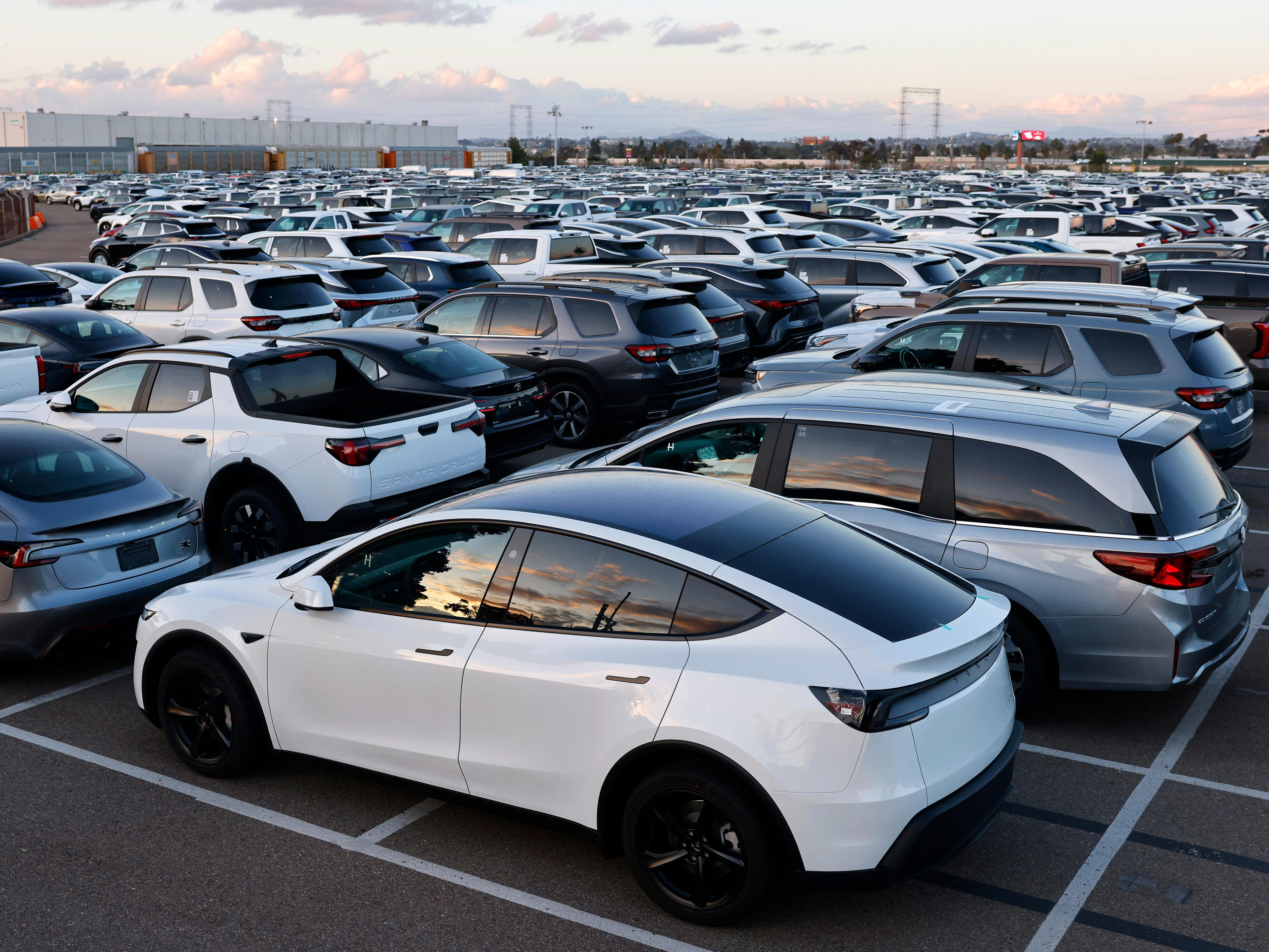 Global EV sales just hit a record, even as automakers tap the brakes