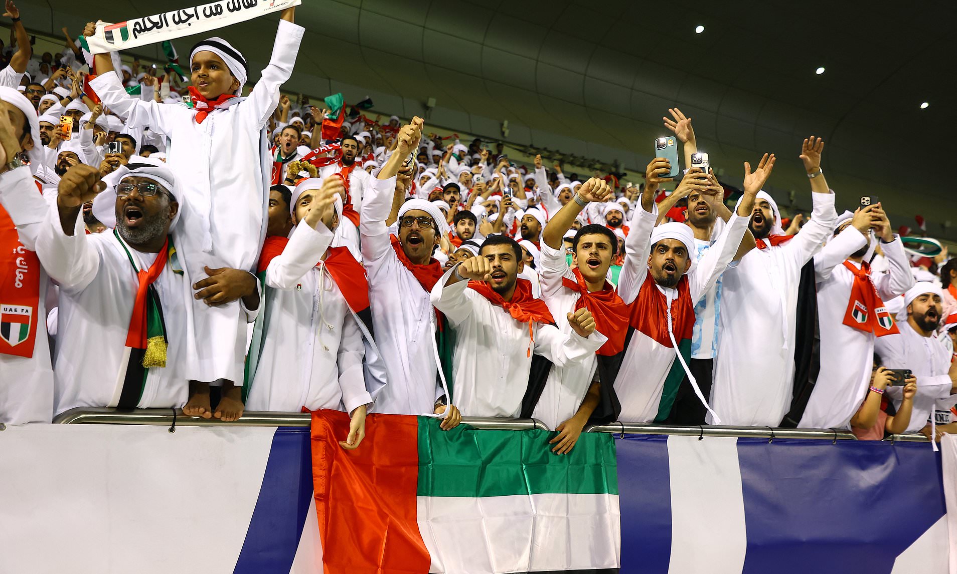 Furious UAE fans chuck sandals, plastic bottles and cups on the pitch ...