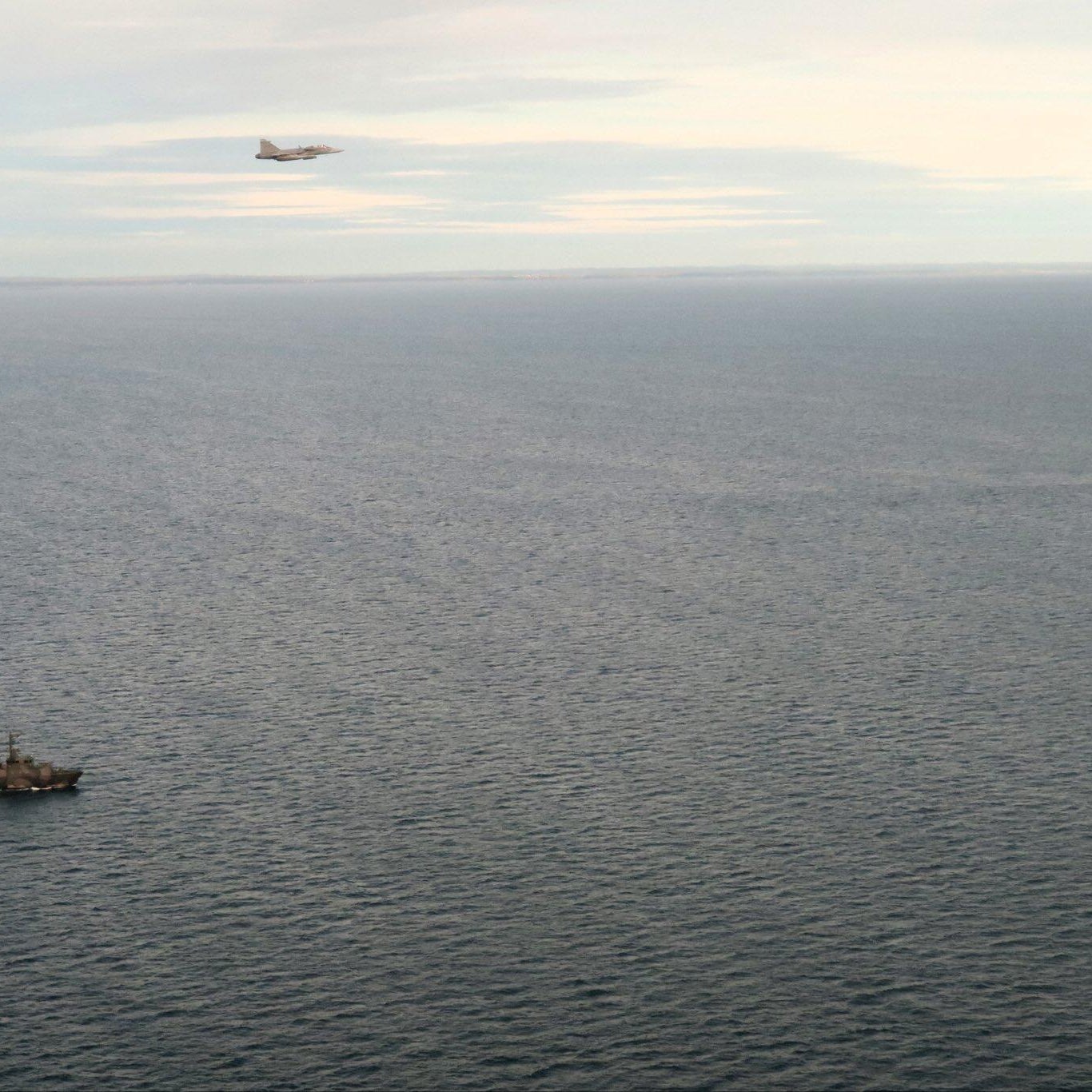 Russian sub being tracked by fighter jets and warships in Baltic Sea