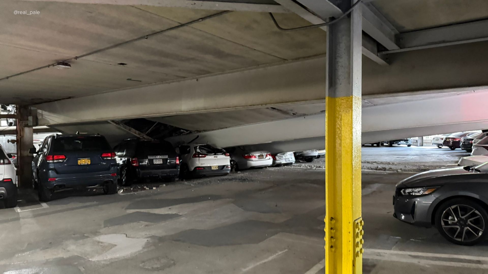 Cars crushed by partial parking garage collapse in White Plains