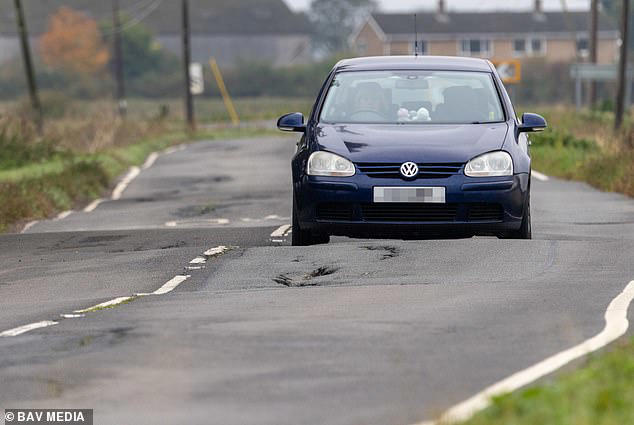 Furious motorists label pothole-ridden A-road as 'Britain's worst' over ...