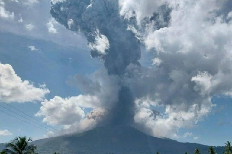 Indonesia volcano erupts, belching ash into night sky
