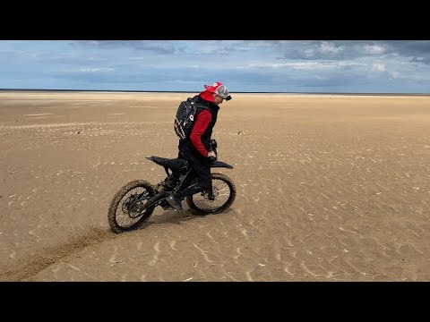 Little Harry rides a full sized electric dirt bike for the first time