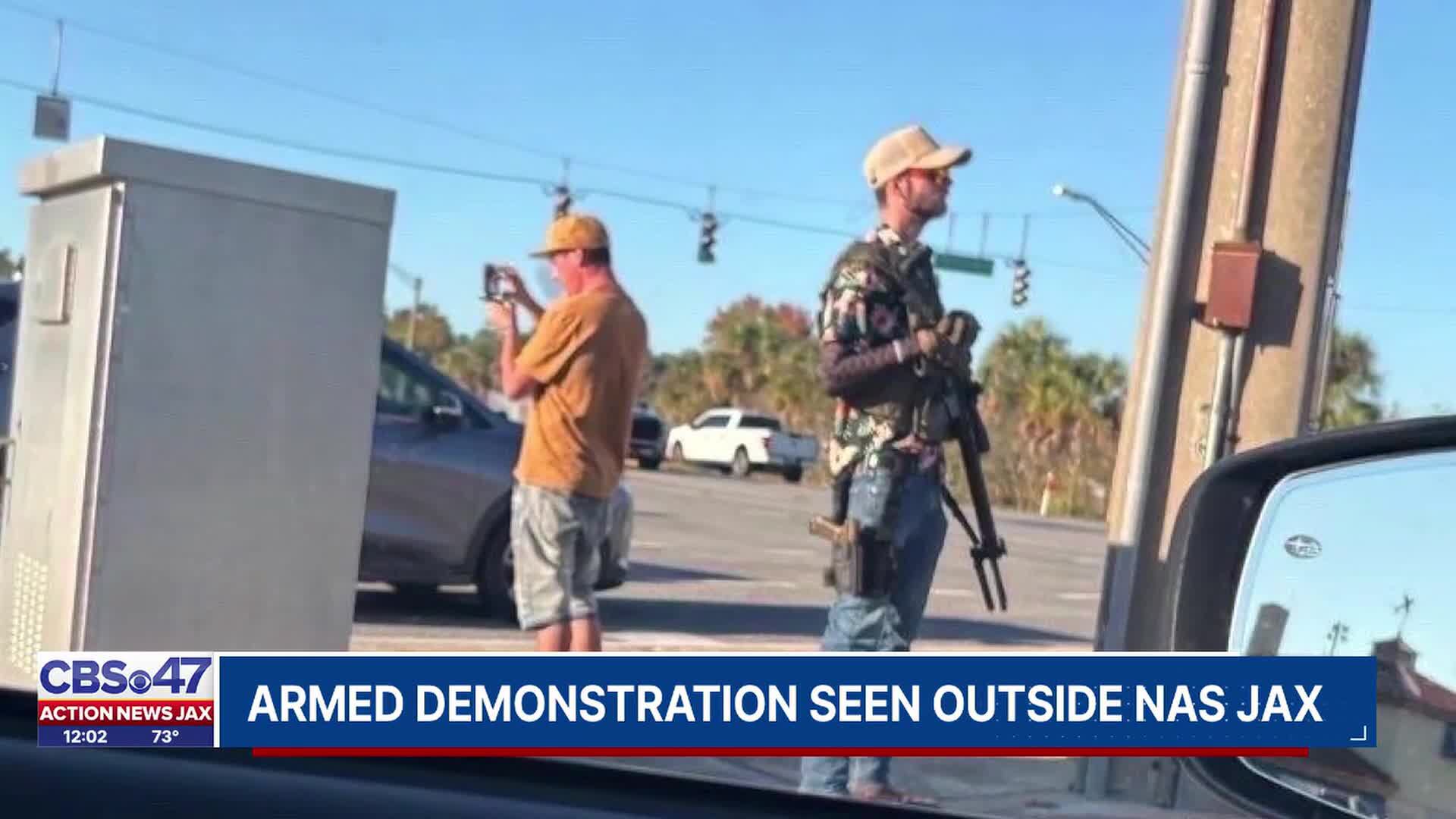 Armed demonstrators seen not breaking any laws with firearms outside ...