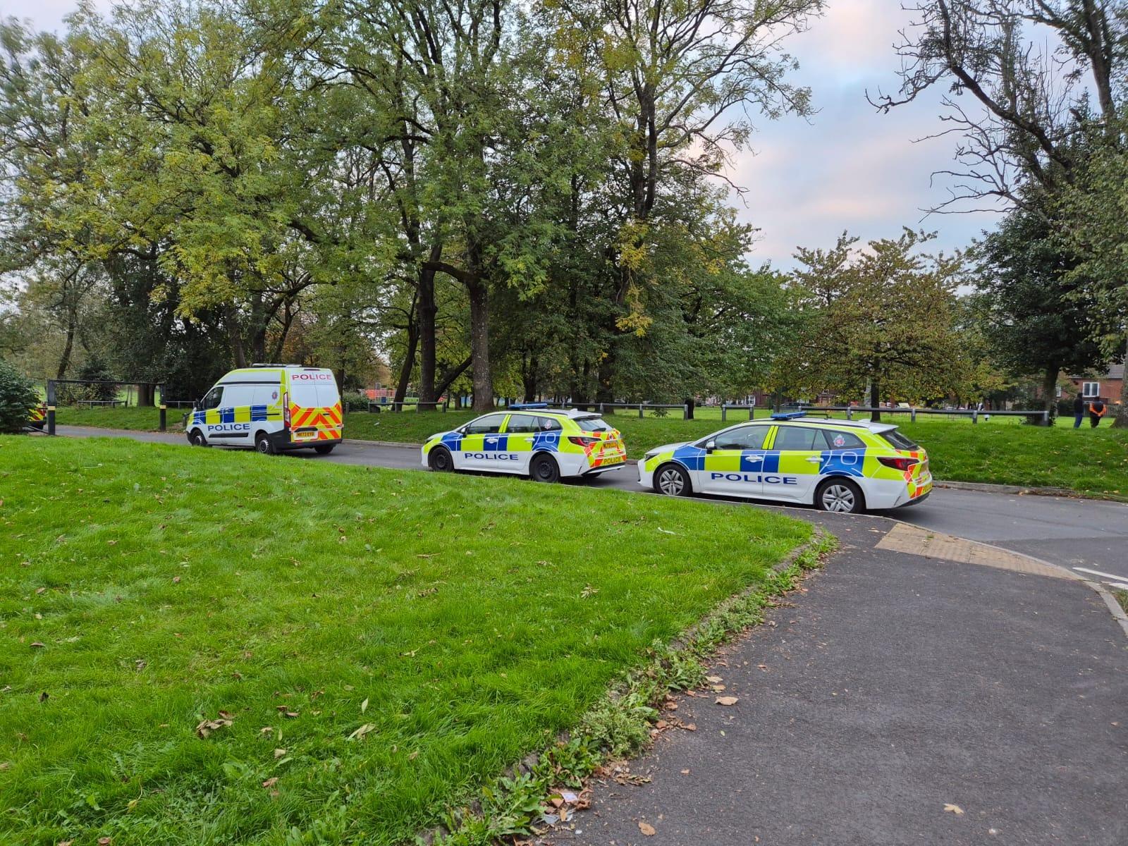 A Wigan park has been cordoned off and an 18-year-old has been taken to ...