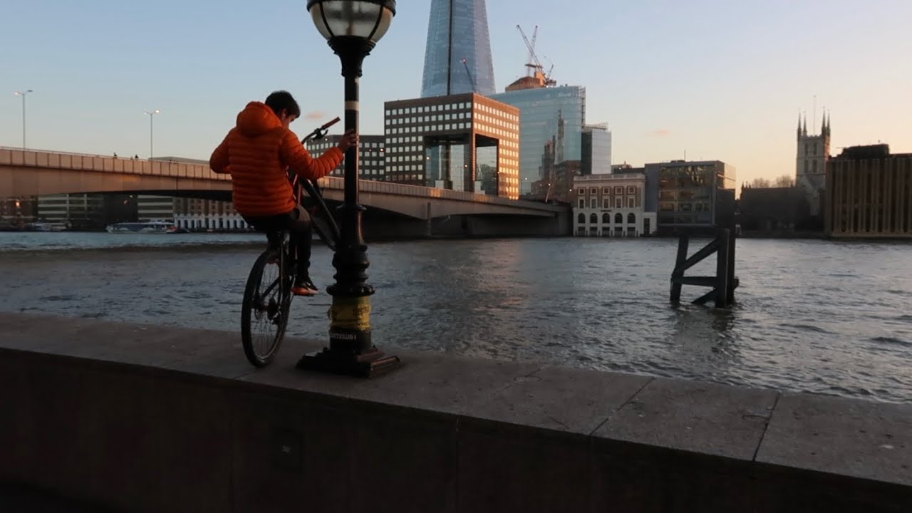 River Thames wheelies on the edge of the bank