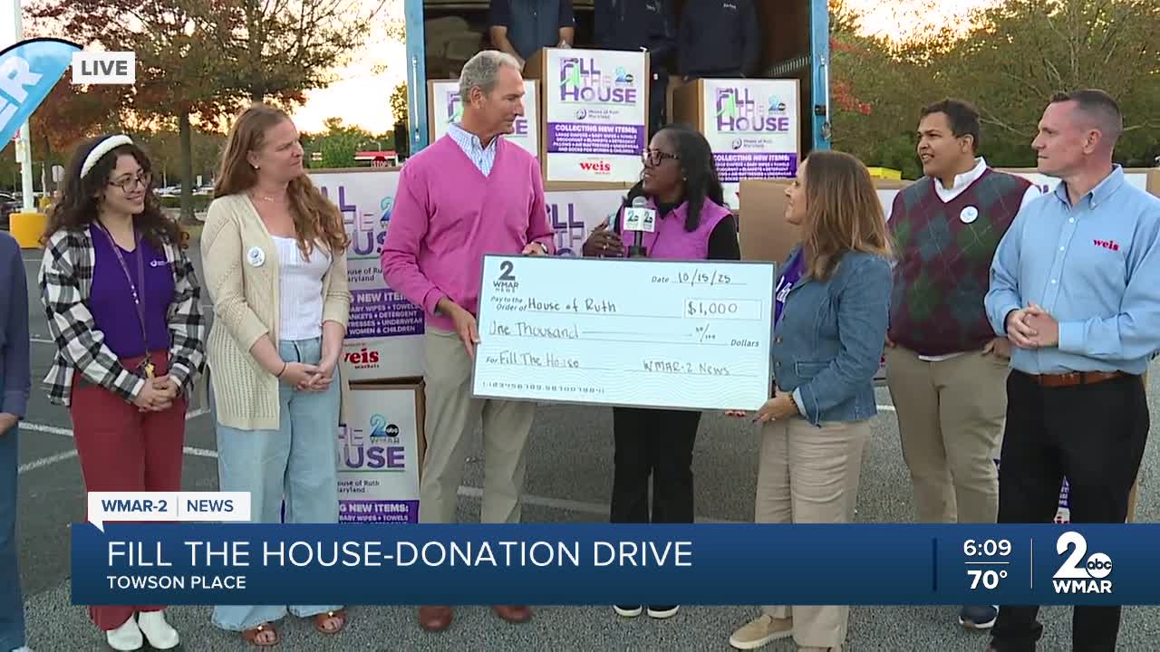 WMAR Vice President, GM Bill Hooper presents $1,000 check to House of ...