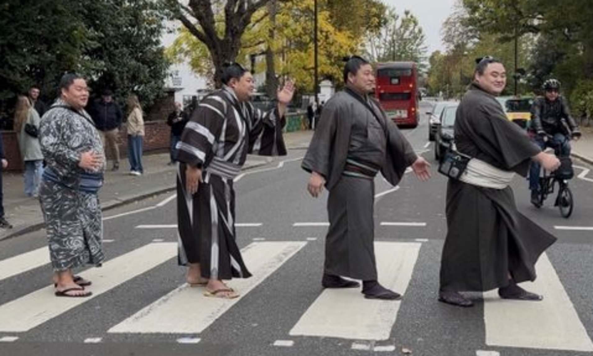 Sumo wrestlers recreate iconic image of the Beatles before competing at ...