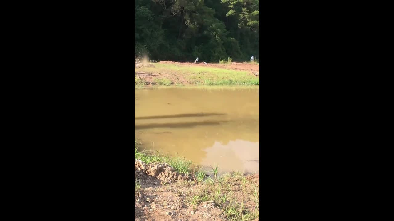Off-road buggy powers through deep mud pits in Yunnan, China