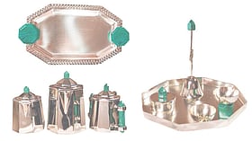 Geometric silverware with malachite accents is redefining festive elegance