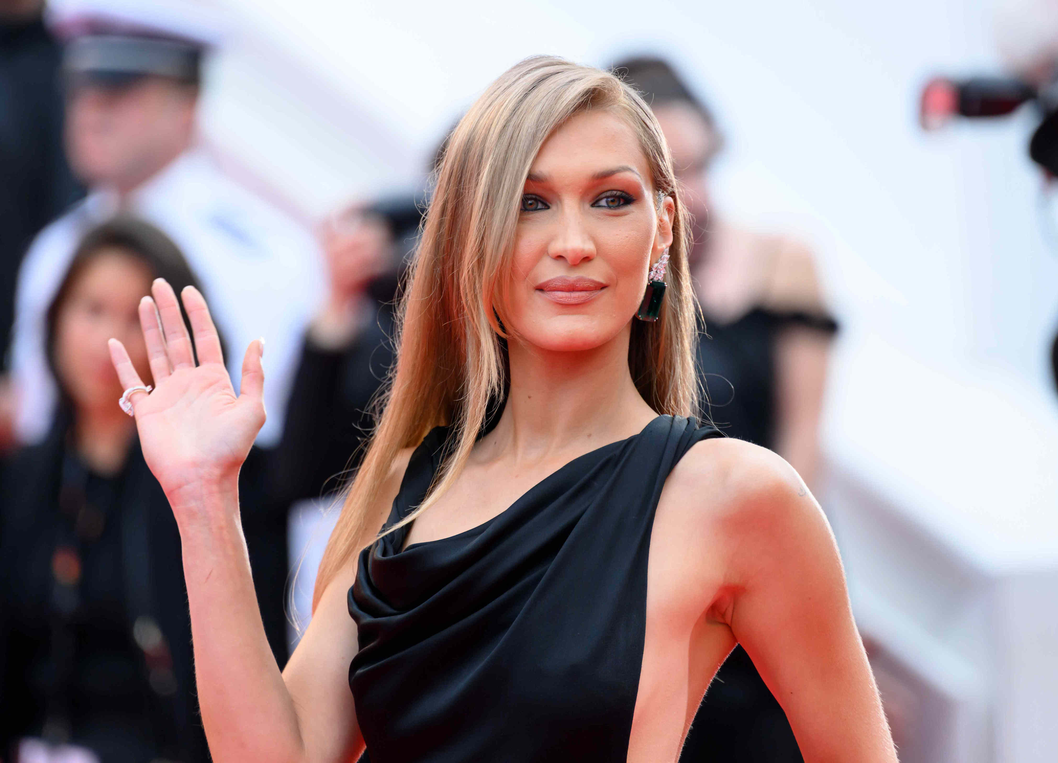 Bella Hadid Models Sheer Crochet Top in New Photo With Boyfriend Adan ...