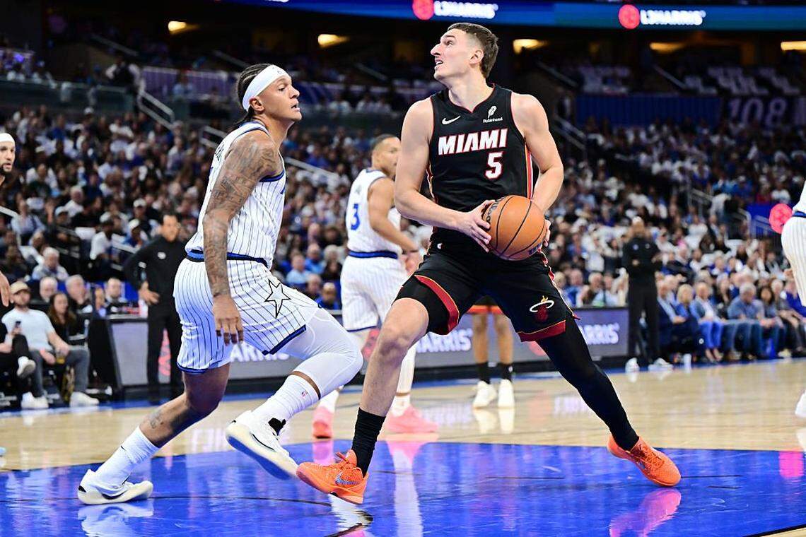 Heat wastes fourth-quarter lead in season-opening loss to Magic ...