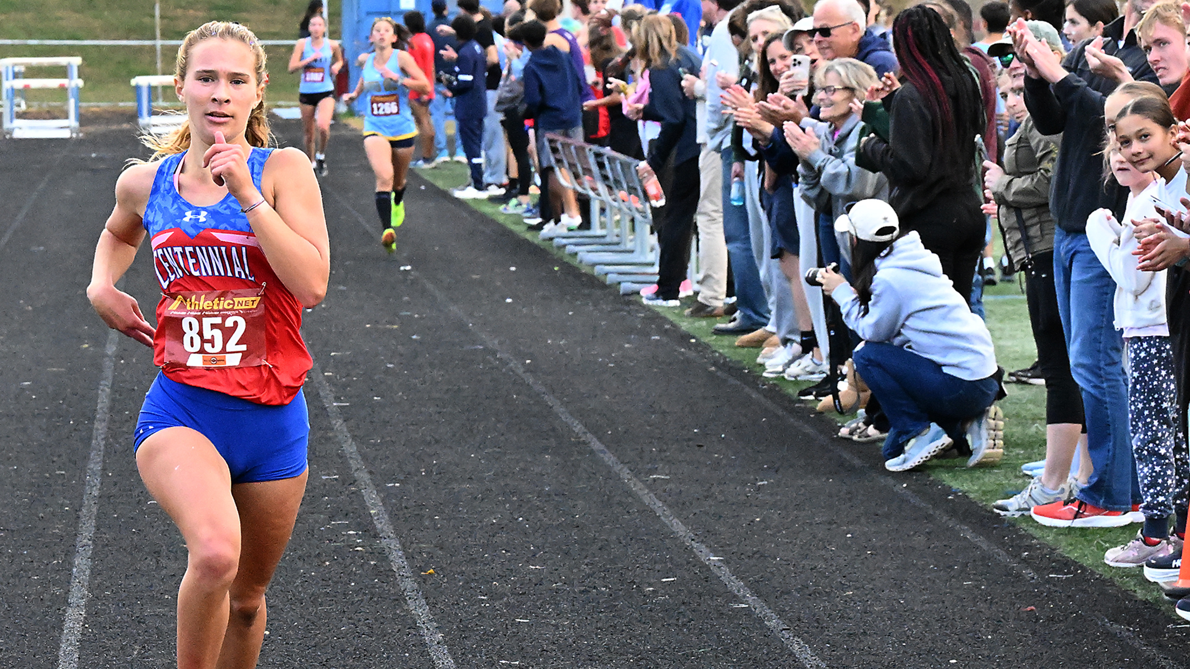 Centennial cross country sweeps team titles at Howard County championship