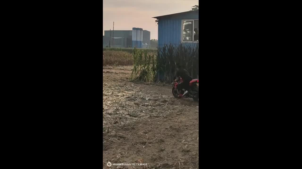Bigbike slide in muddy rice field in Shandong, China
