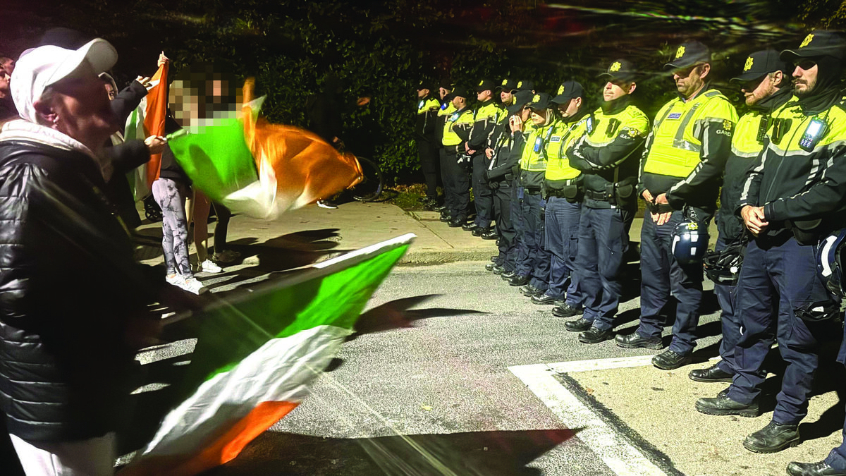 Flares and bottles thrown at gardaí as hundreds protest at Citywest for ...