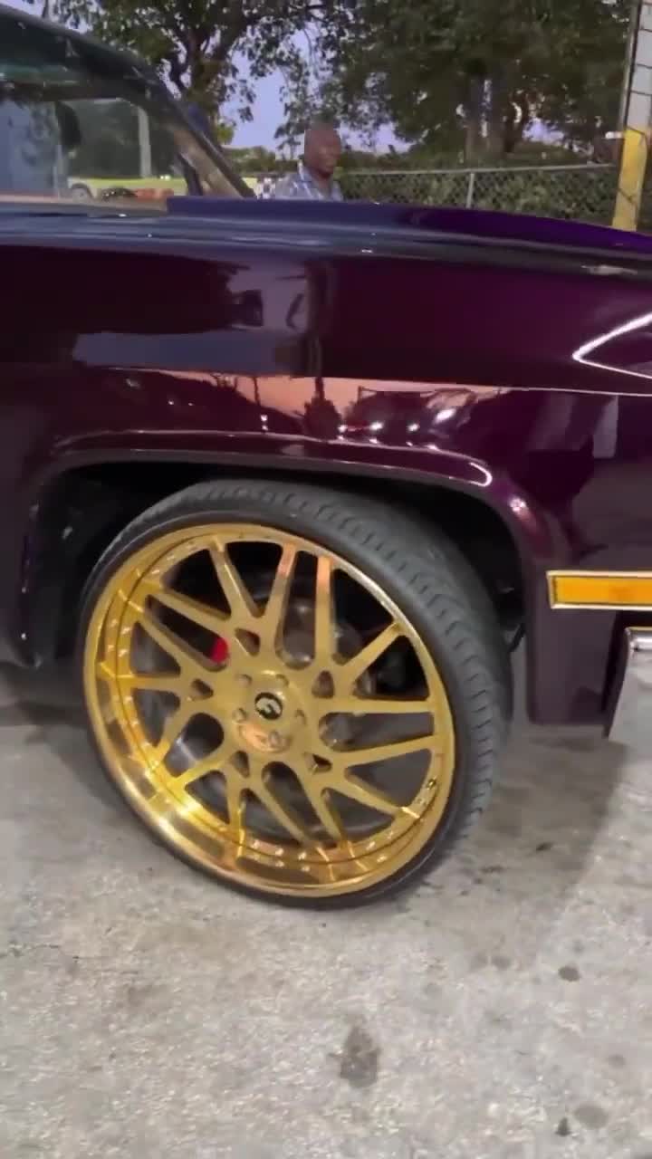 Candy purple Chevy C10 on gold 26” Forgiatos