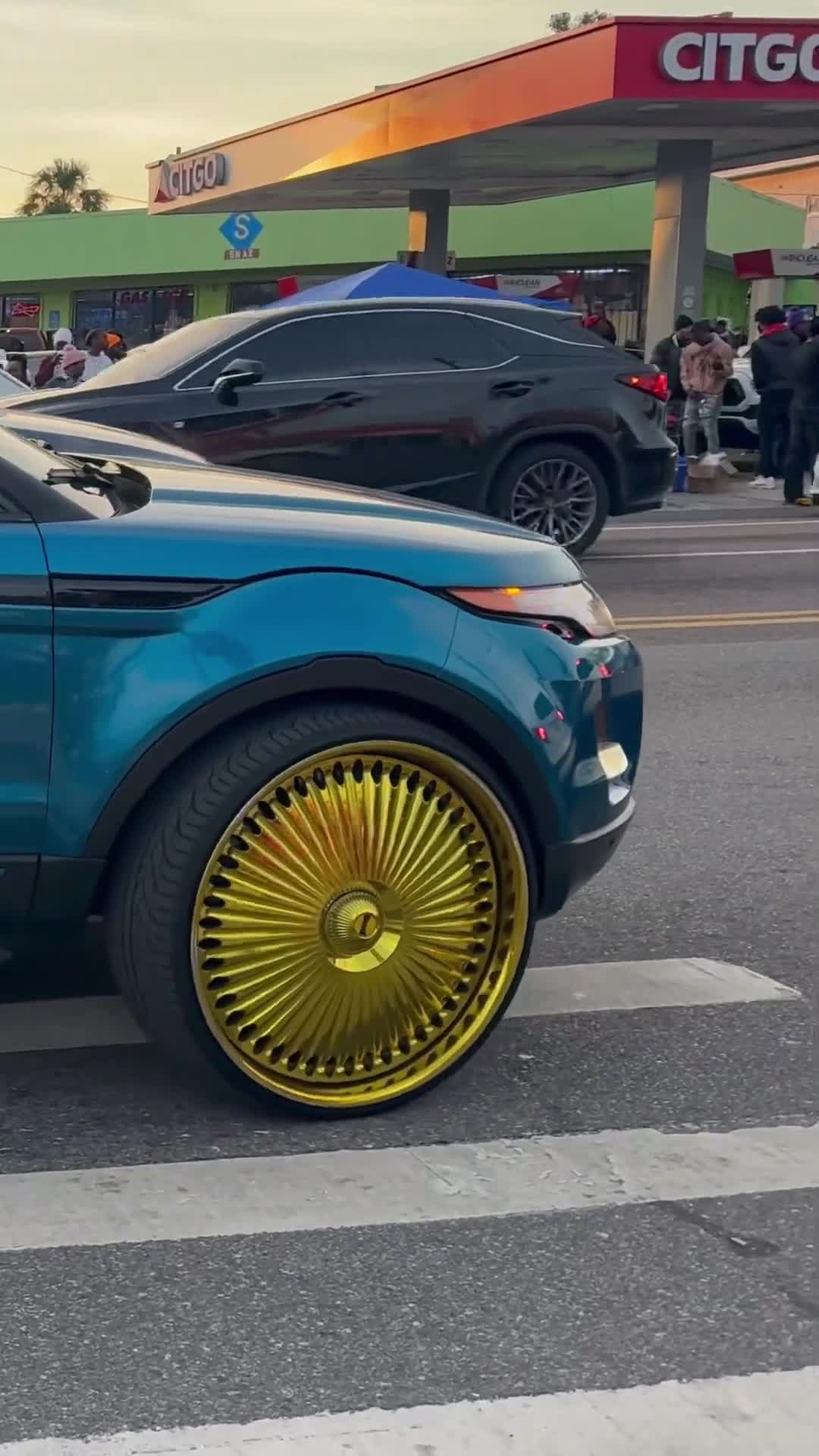 Range Rover Evoque on gold 26” DUB floaters