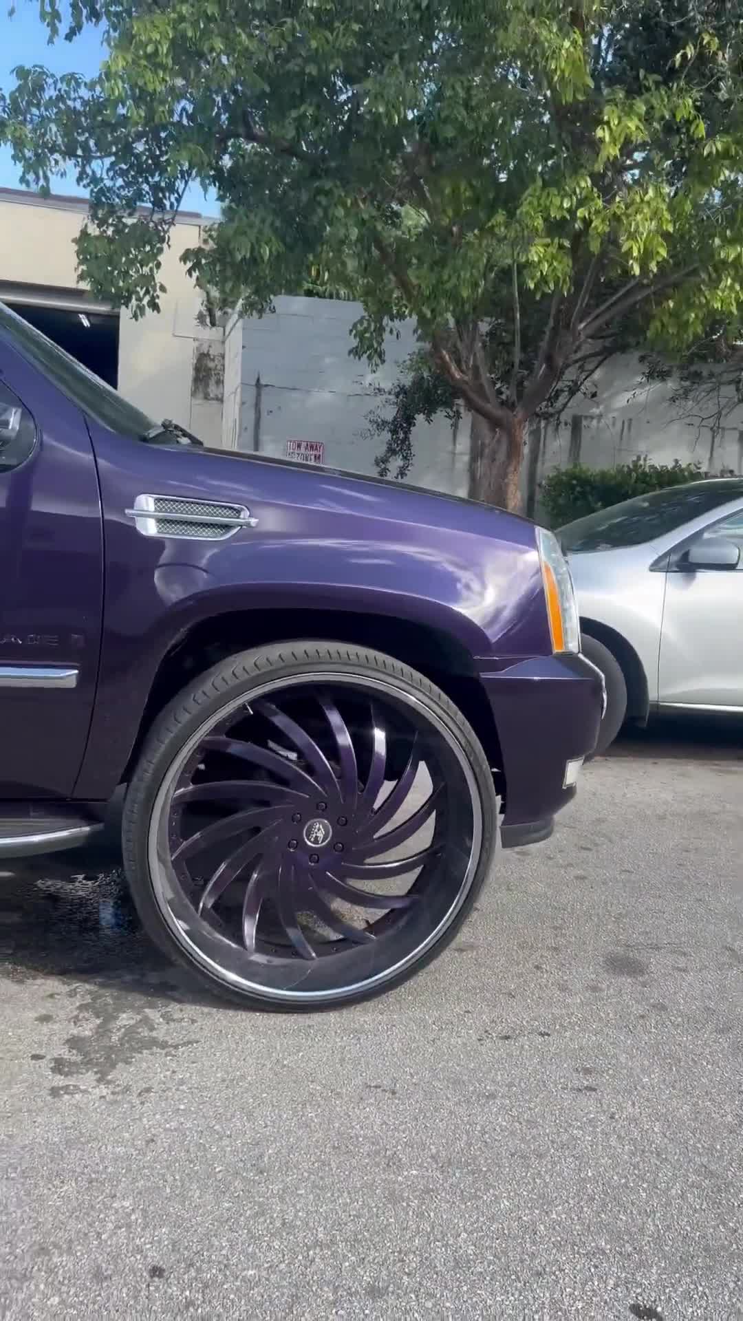 Purple Cadillac Escalade on 32’s Amani