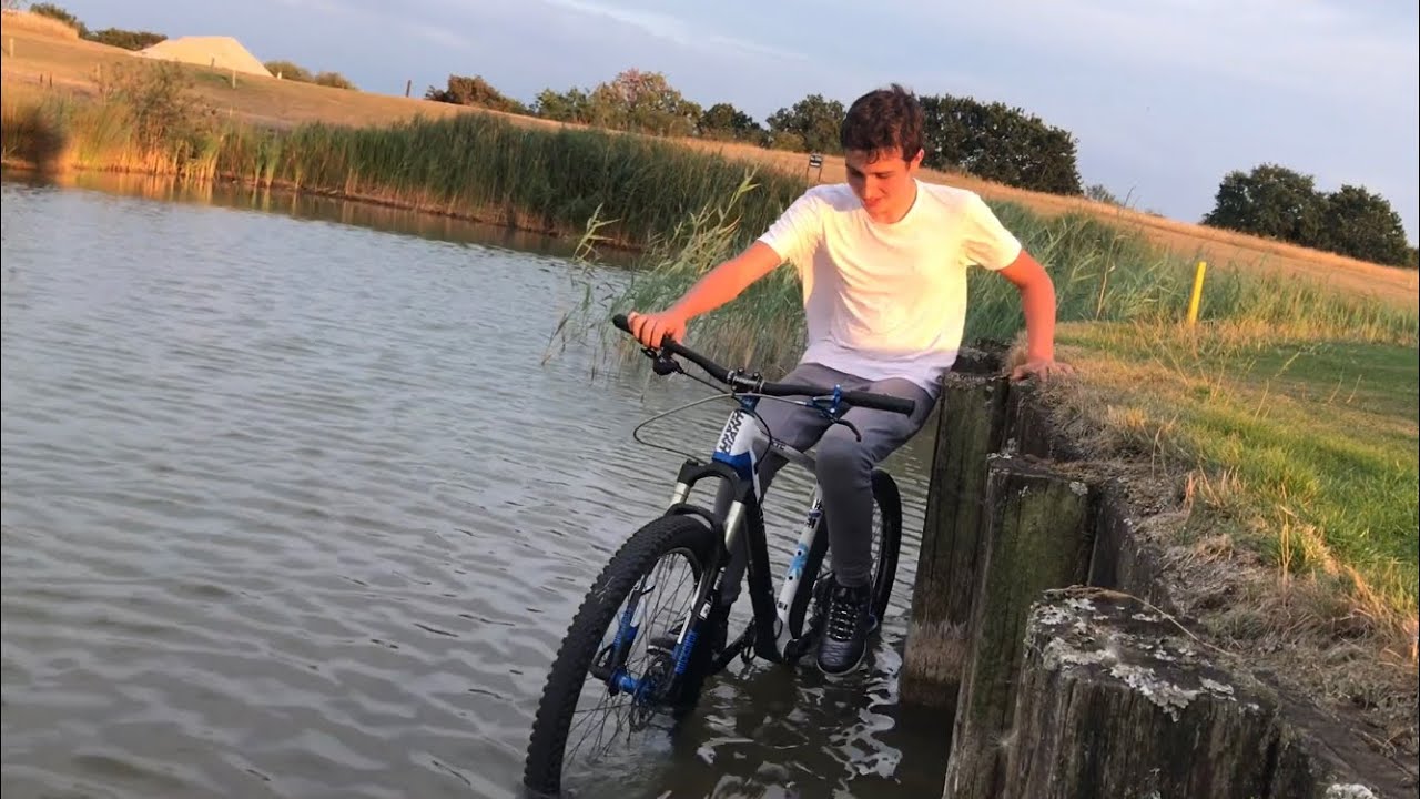 He tries to ride straight through a freezing pond
