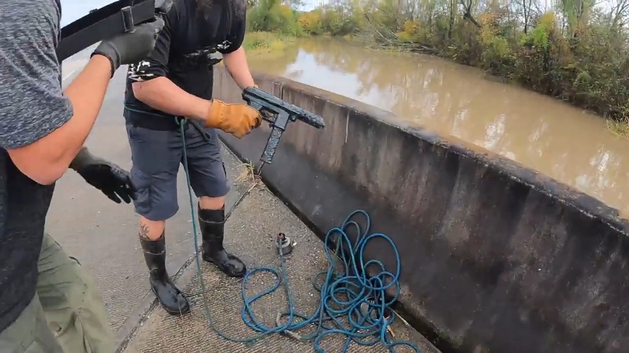 Lightning, rain, and a machine gun — the craziest magnet fishing day ever!