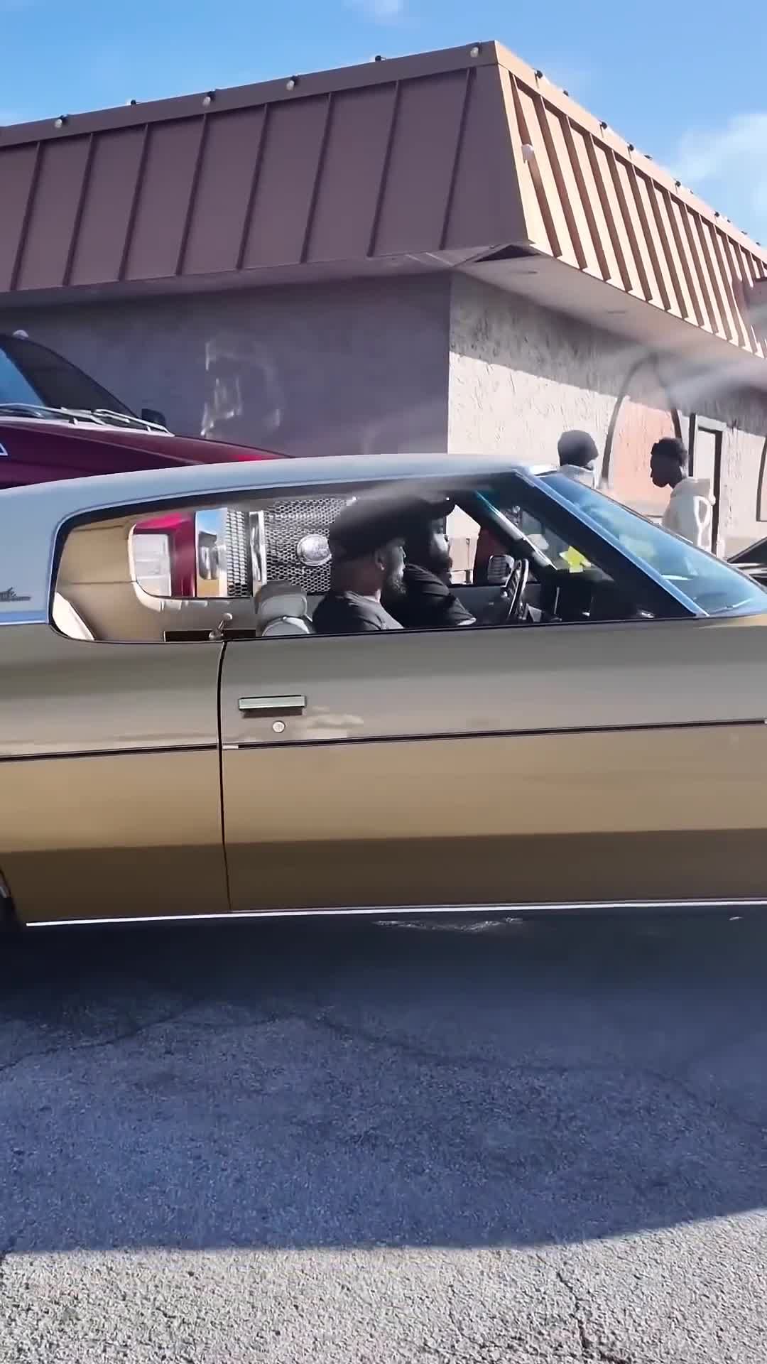 73 Chevy donk on gold 26’s Forgiato wire wheels