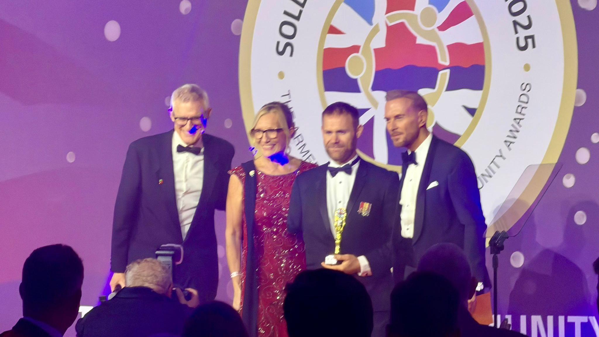 Triple-amputee commando wins inspiration award