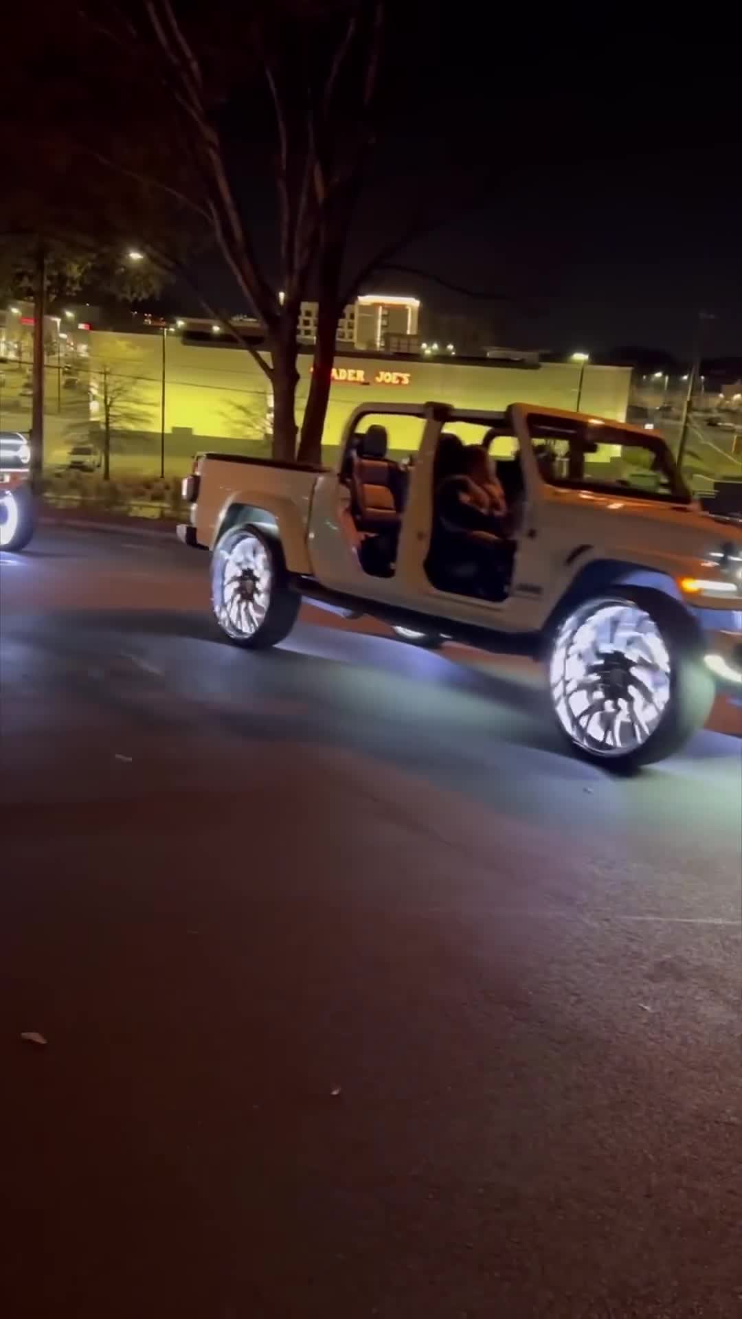 White Jeep Gladiator on 28’s and Ford Bronco on 34’s riding back 2 back