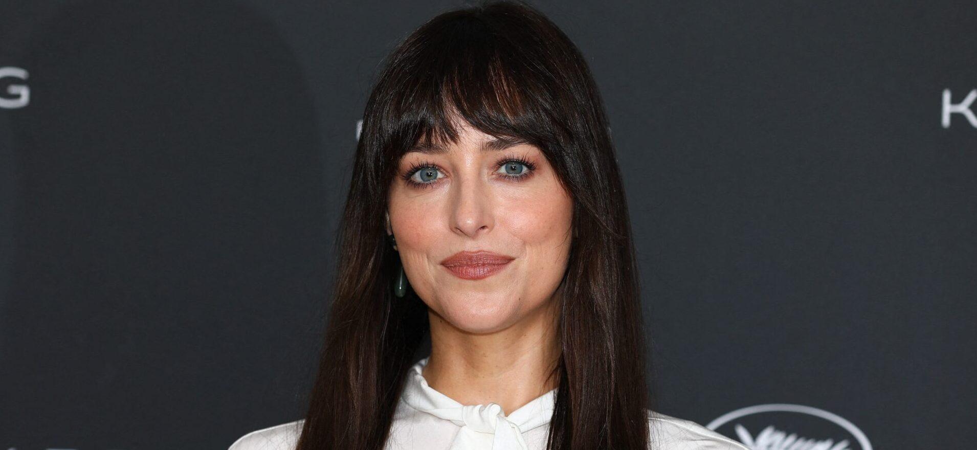 Dakota Johnson steps out with a new face after Chris Martin split