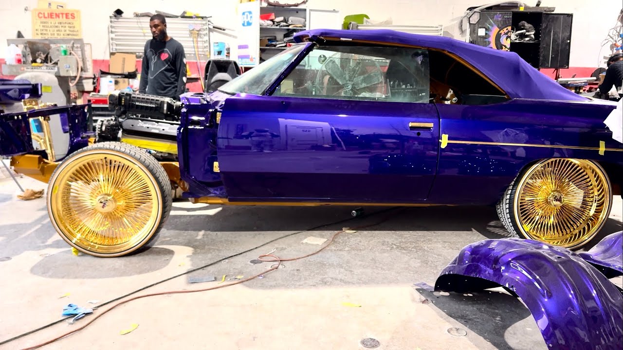 SuperchargedKid's 6-figure 73 Chevy donk build on 24" gold Daytons