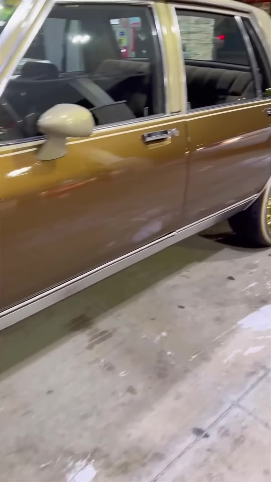 Chungo’s Chevy box on gold 26’s knock-off wire wheels