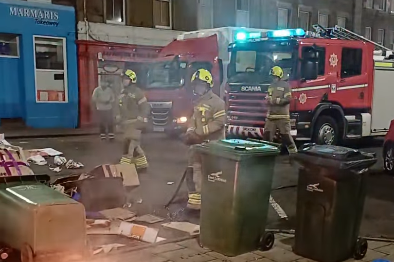 East Lothian fire crews battle blaze as rubbish scattered across high ...