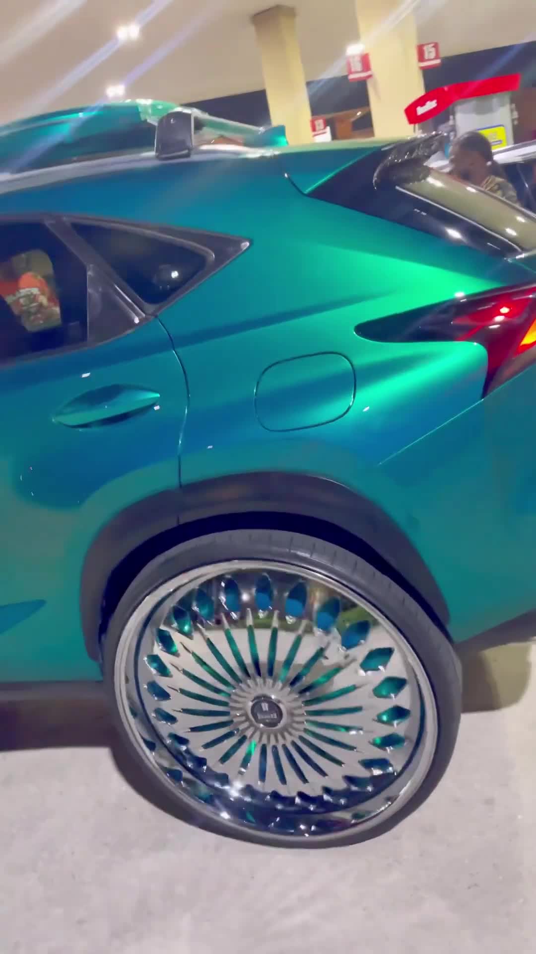Candy Teal Lexus NX on 30’s DUB Floaters