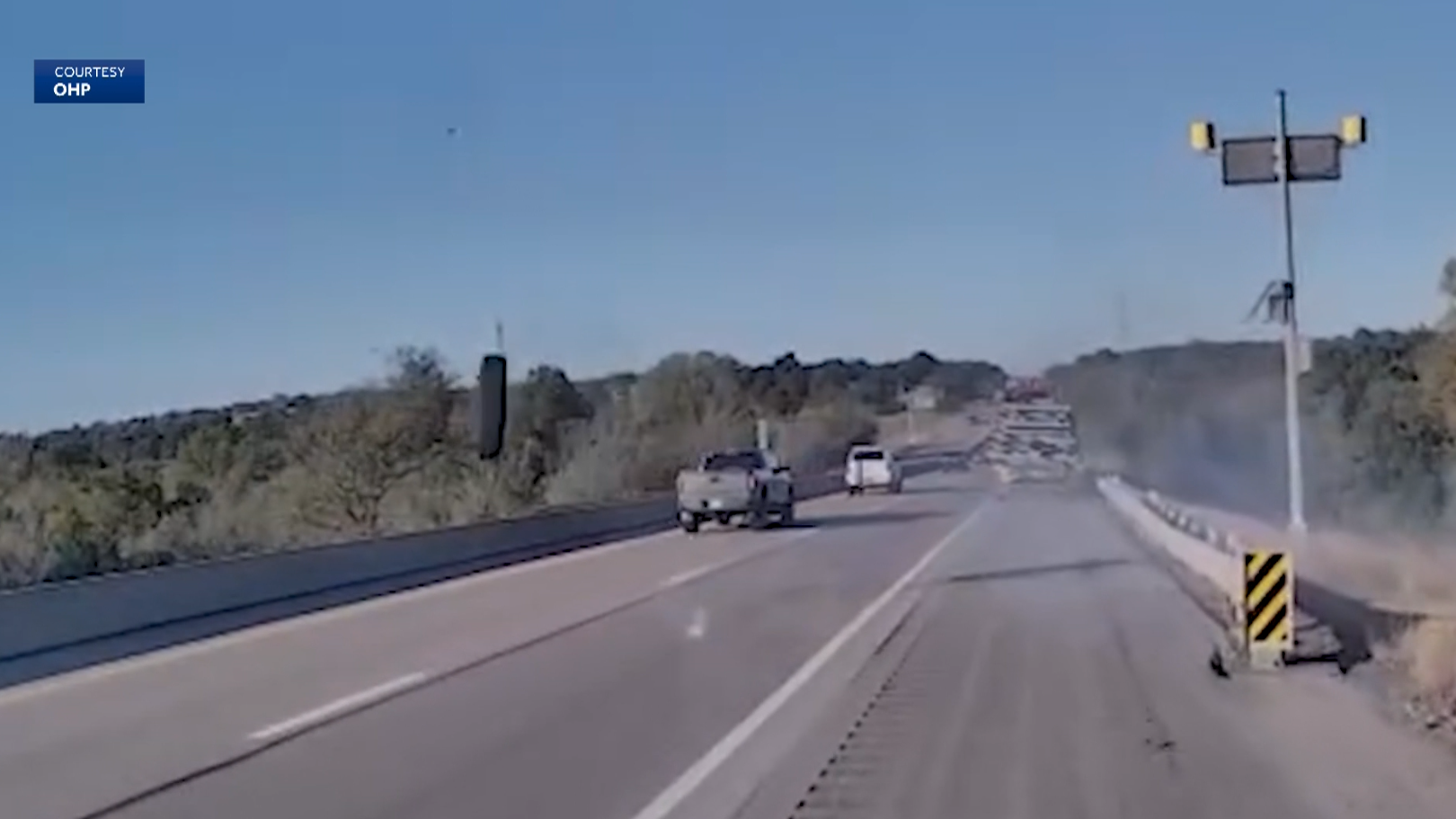 OHP dashcam captures scary moment tire flies off semi-trailer on Turner ...