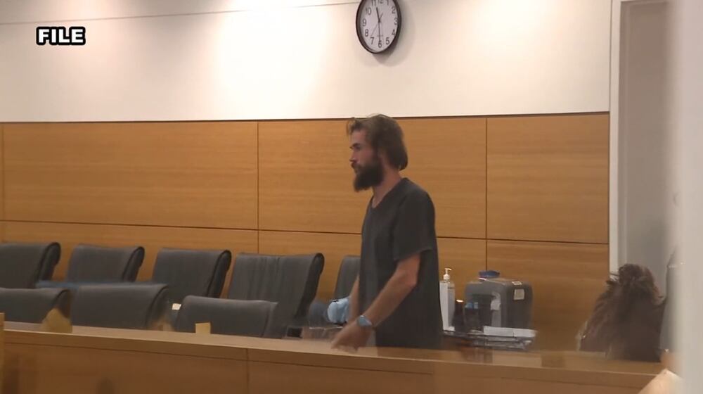 Man accused of killing mother, boyfriend appears in court