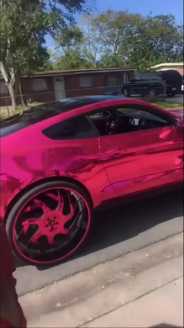 Chrome pink Ford Mustang on 30's Forgiatos