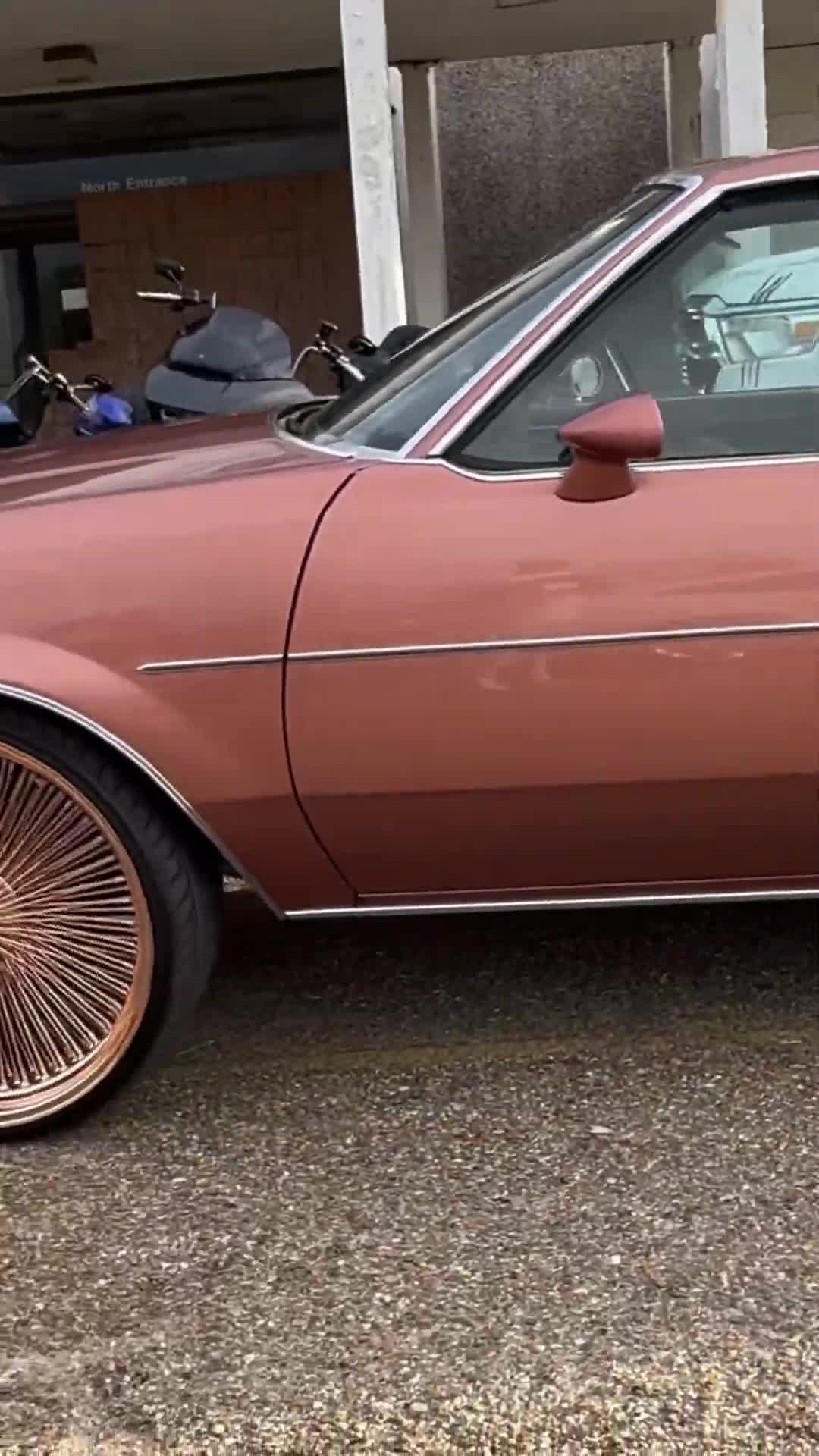 Rosegold Buick Regal on 24’s Daytons