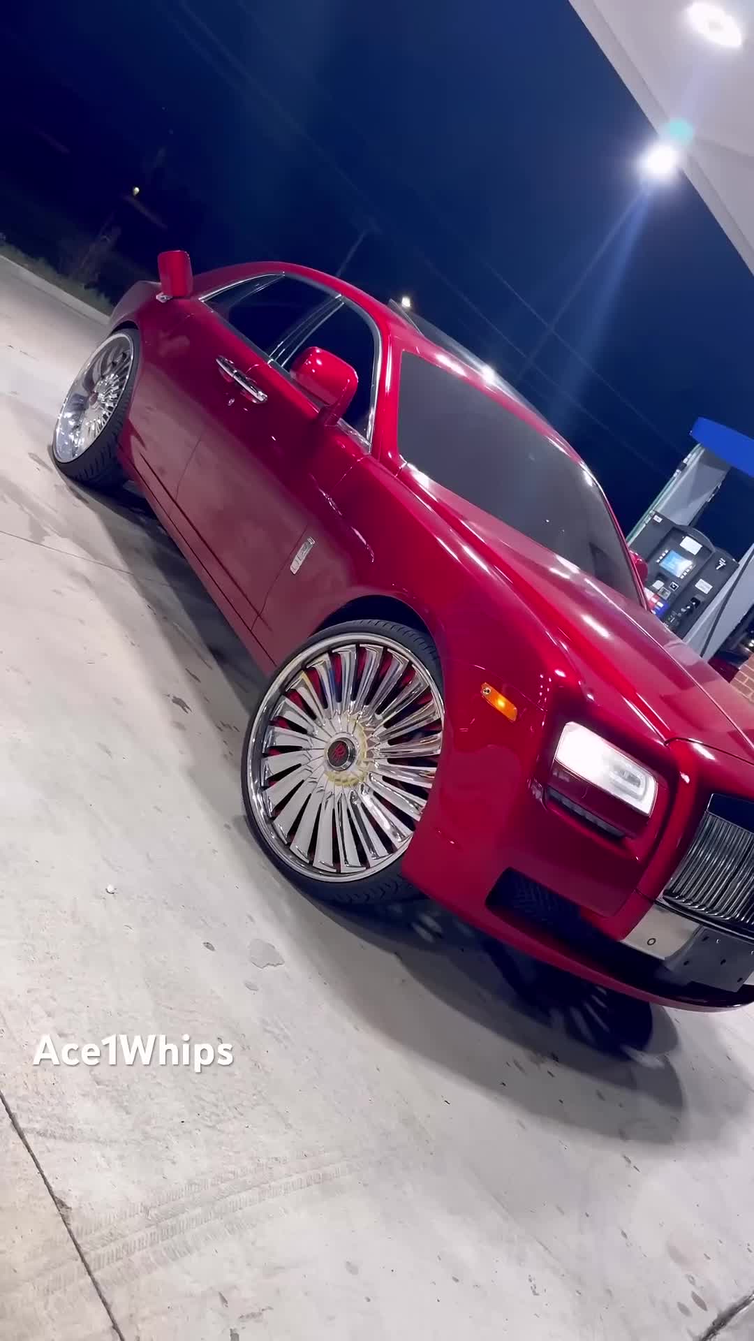 Candy red Rolls-Royce Ghost on 28” DUB floaters in Memphis
