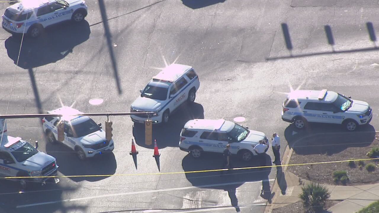 Large police presence blocking intersection near Uptown Charlotte
