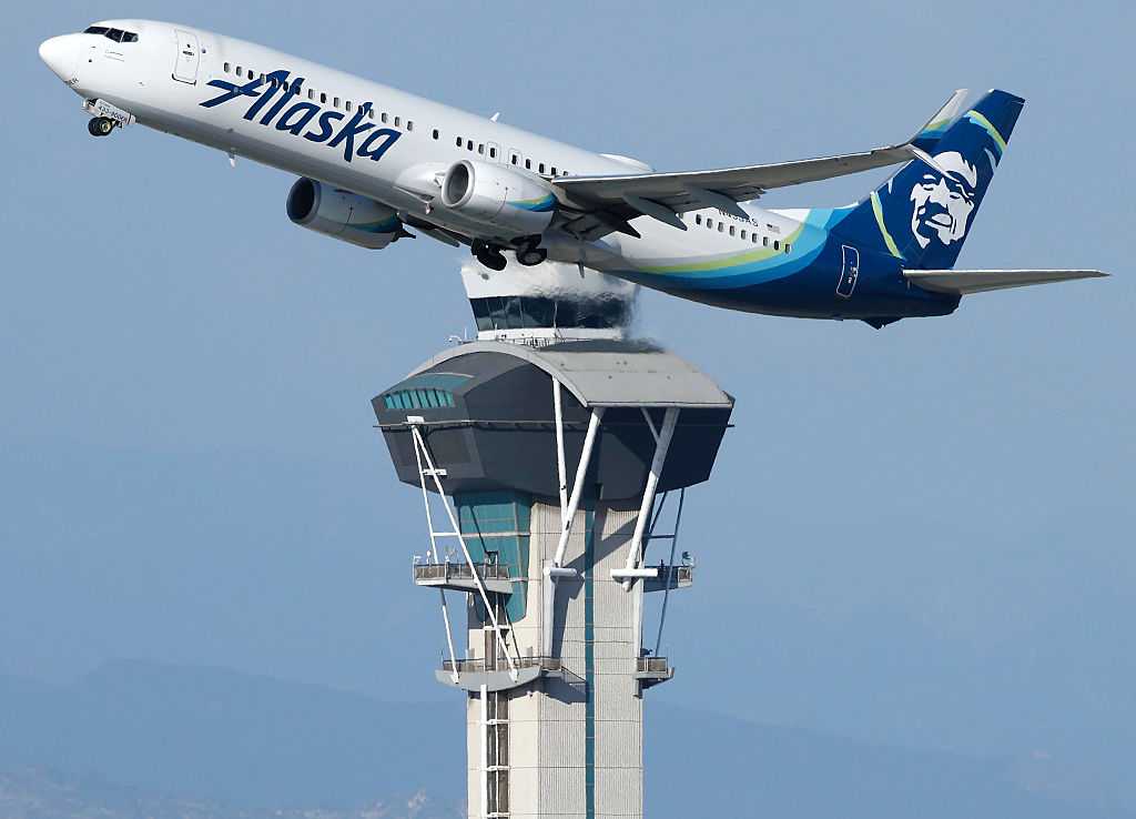 Alaska Airlines says an information technology outage is grounding its ...
