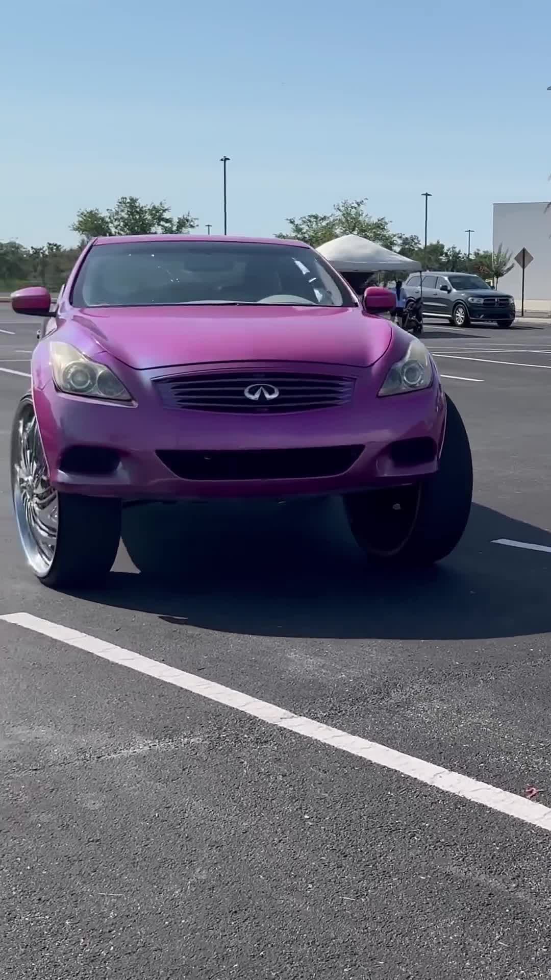 Infiniti M on 30’s DUB floaters and Infiniti G37 coupe on 30’s DUB floaters